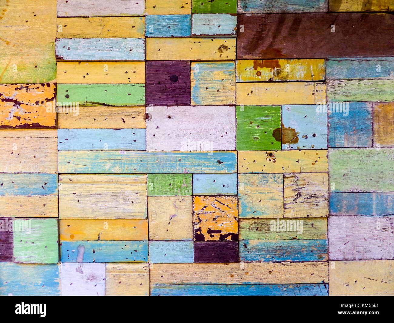 Wood pieces random fancy color on background Stock Photo - Alamy