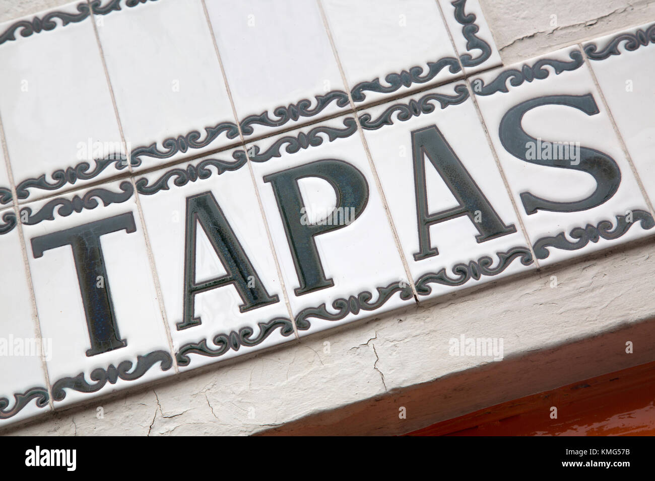 Tapas Sign on Building Facade with Diagonal Slant Stock Photo - Alamy