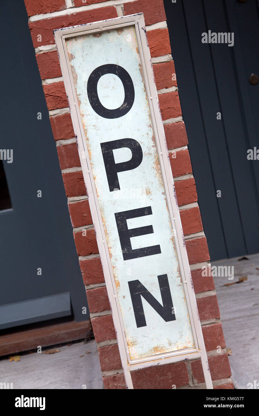 Open Sign outside Shop on Diagonal Tilt Stock Photo - Alamy