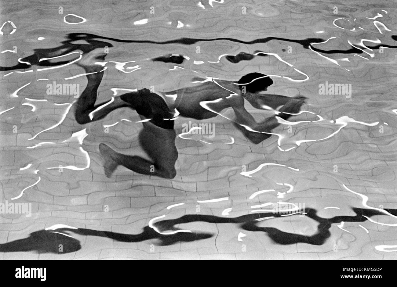Person underwater swimming pool Black and White Stock Photos & Images ...
