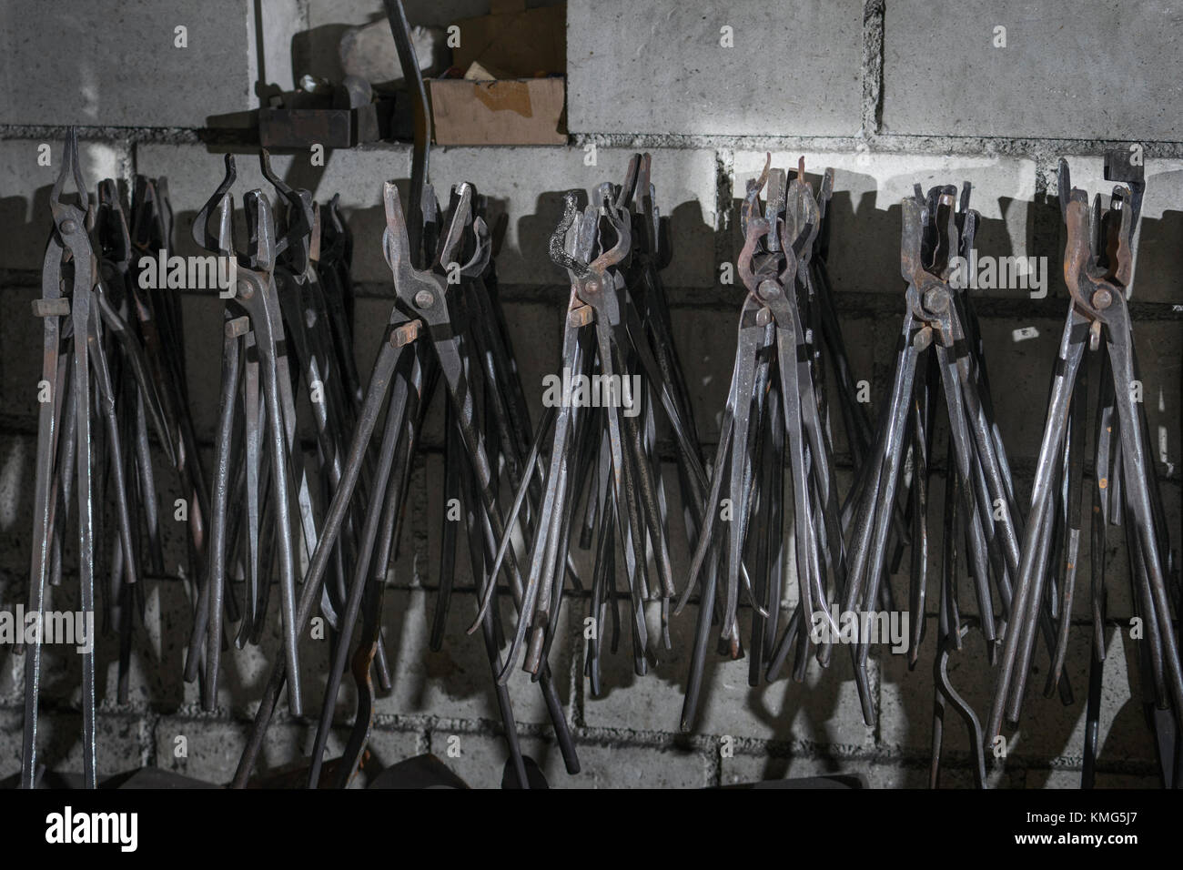 Pliers at traditional blacksmith shop Stock Photo - Alamy