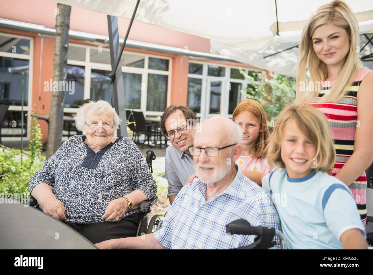 Portrait of multi-generation family at nursing home Stock Photo - Alamy