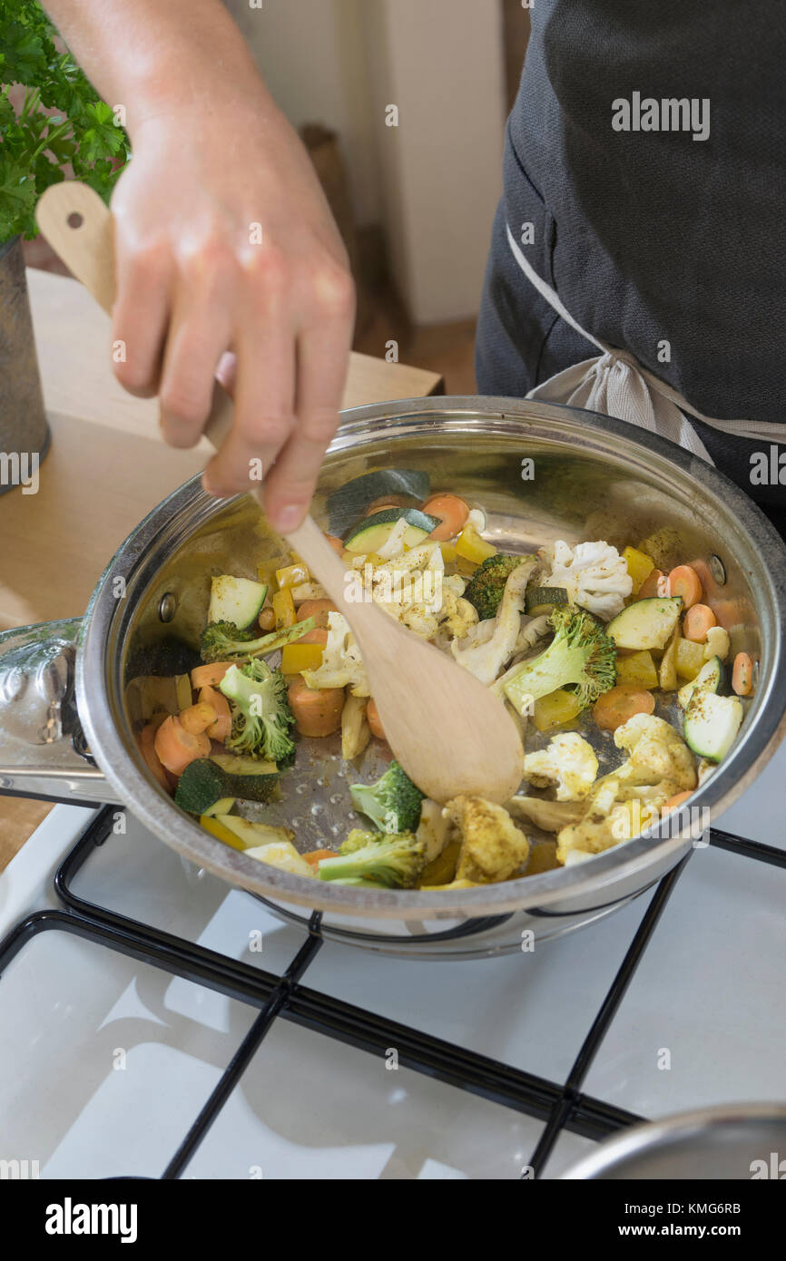 Stirring in the pan hi-res stock photography and images - Alamy