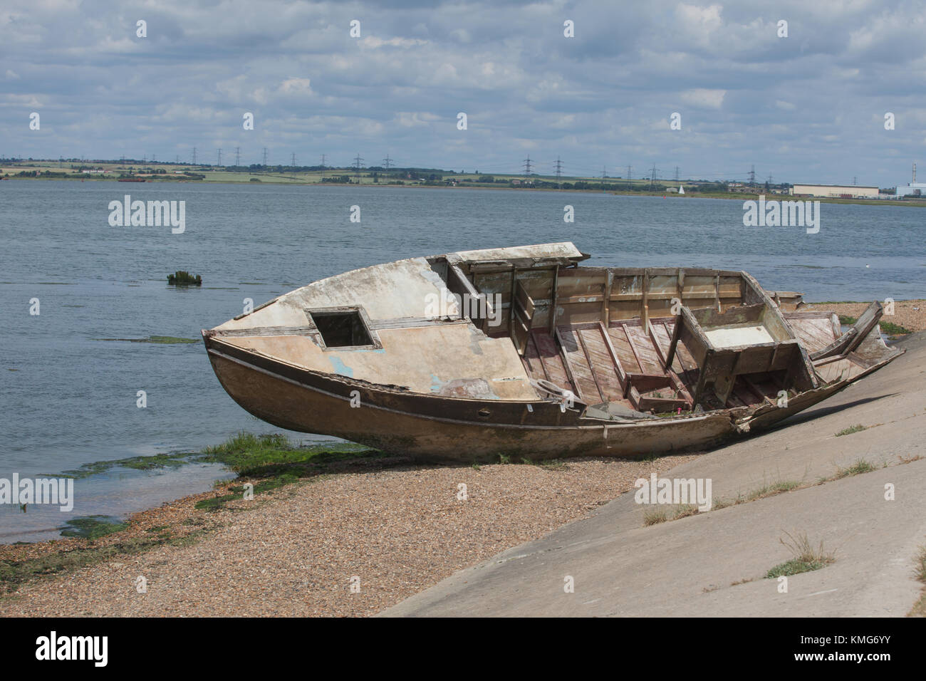 photo of an old and abandoned wooden boat Stock Photo - Alamy