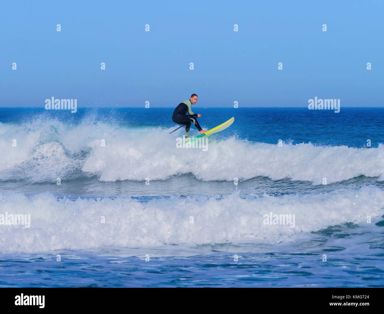 Wave riding hi-res stock photography and images - Alamy