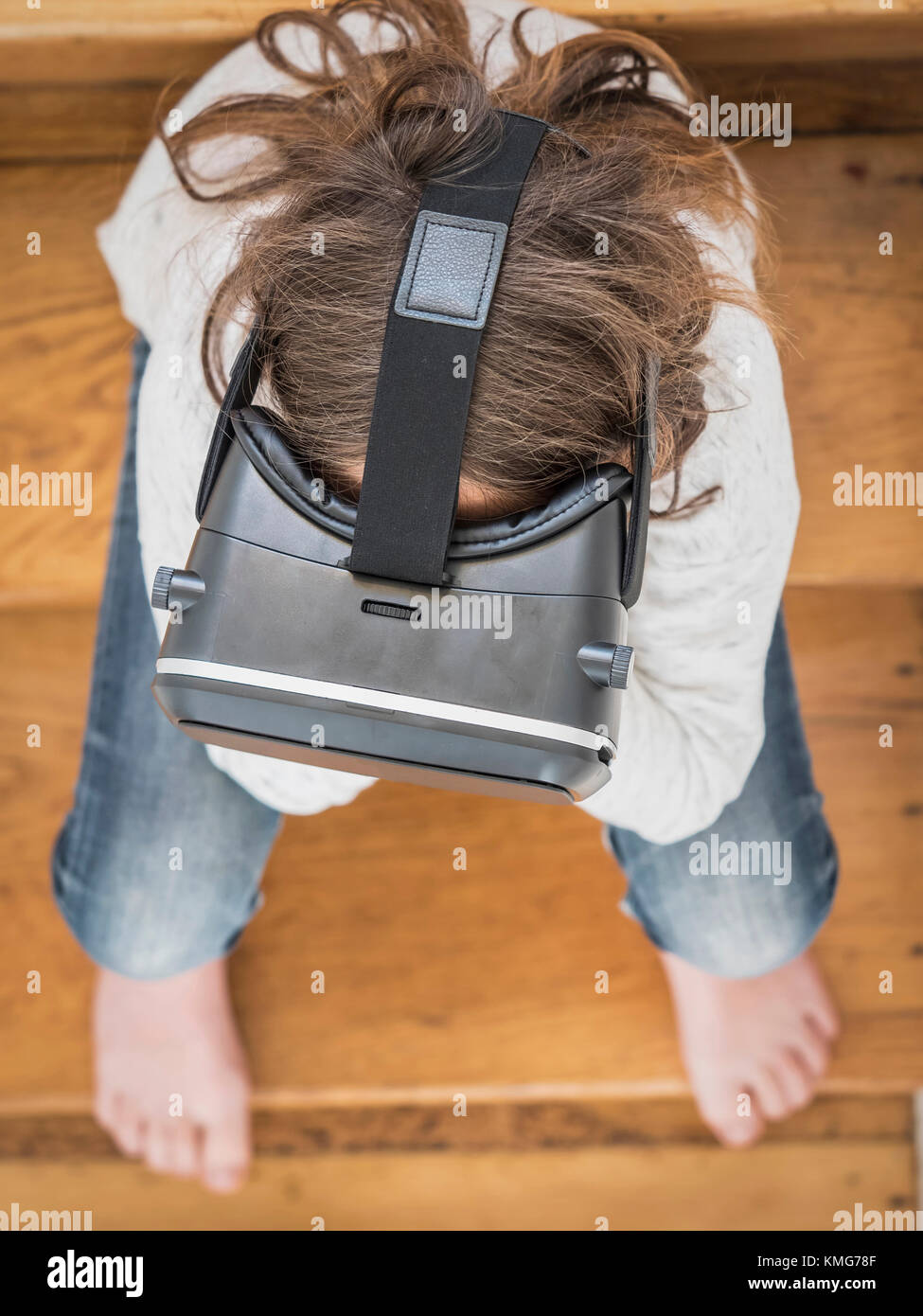 Girl wearing virtual reality glasses Stock Photo - Alamy