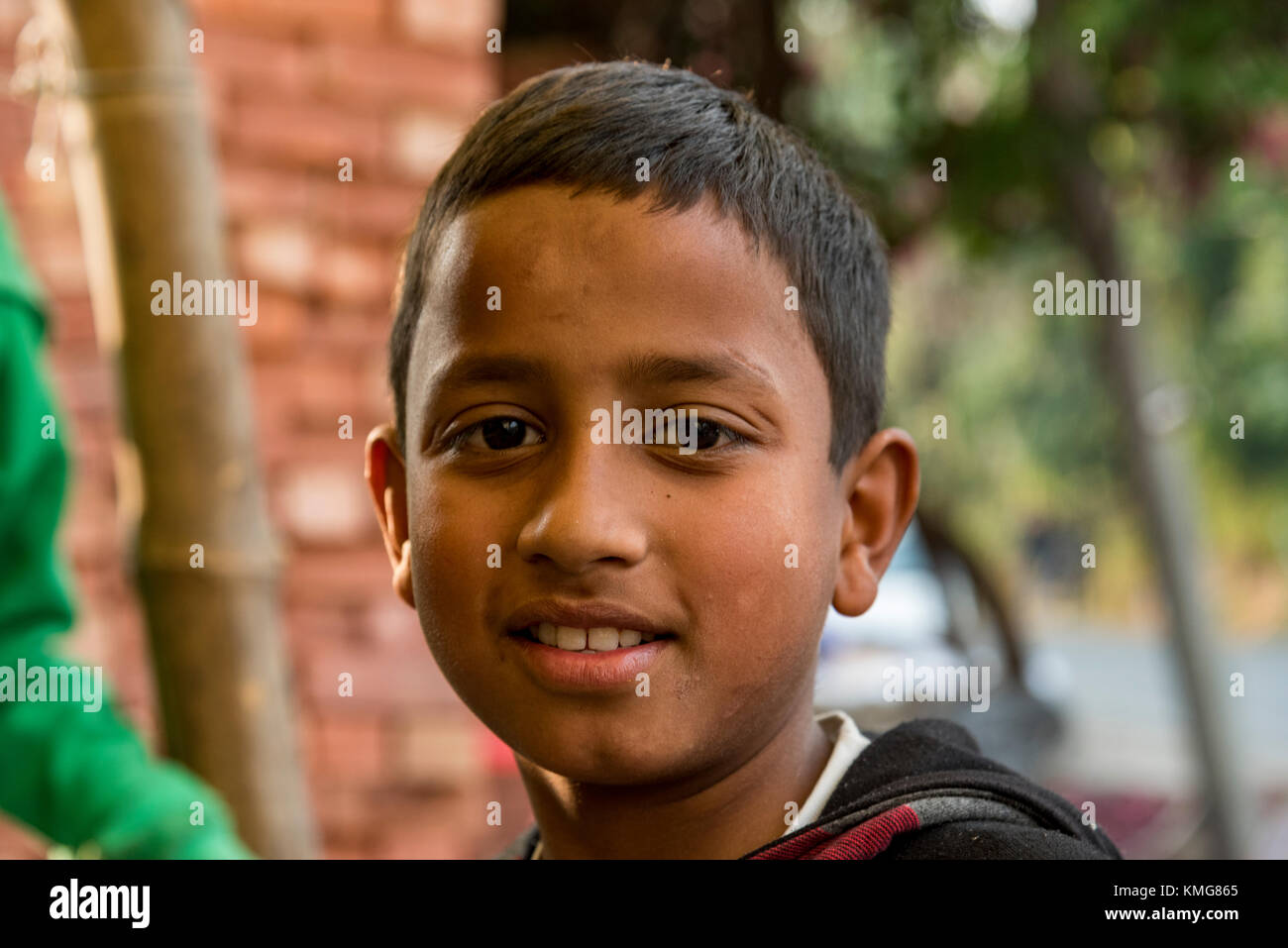 Portrait of a poor Indian boy Stock Photo - Alamy