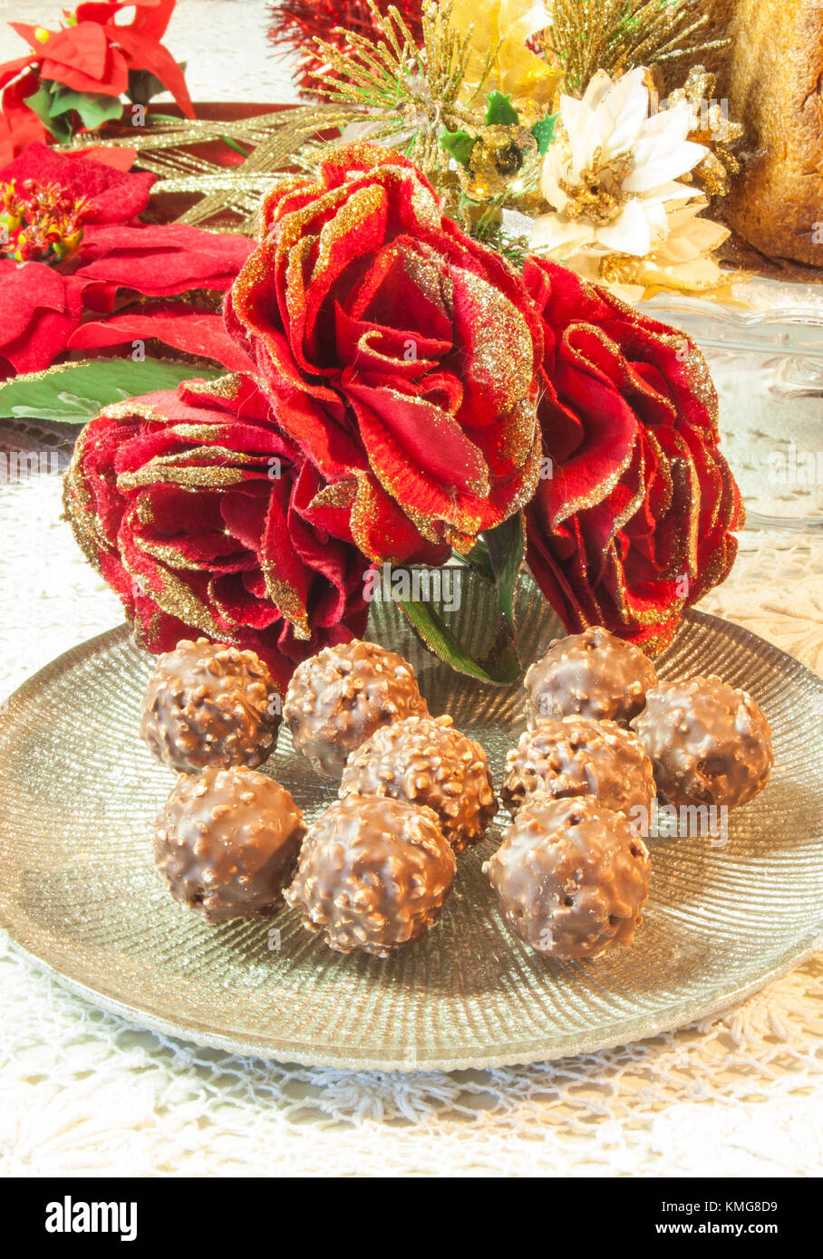 Chocolates on an elegant table with Christmas decorations Stock Photo ...