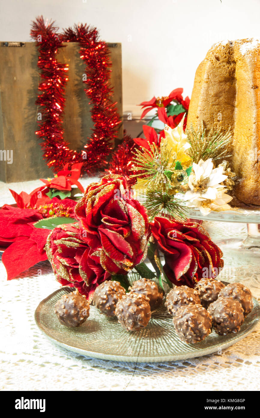 Chocolates on an elegant table with Christmas decorations Stock Photo ...