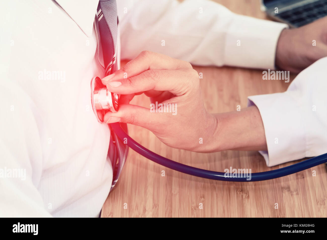 doctor hand holding stethoscope in front of patient chest, listen ...