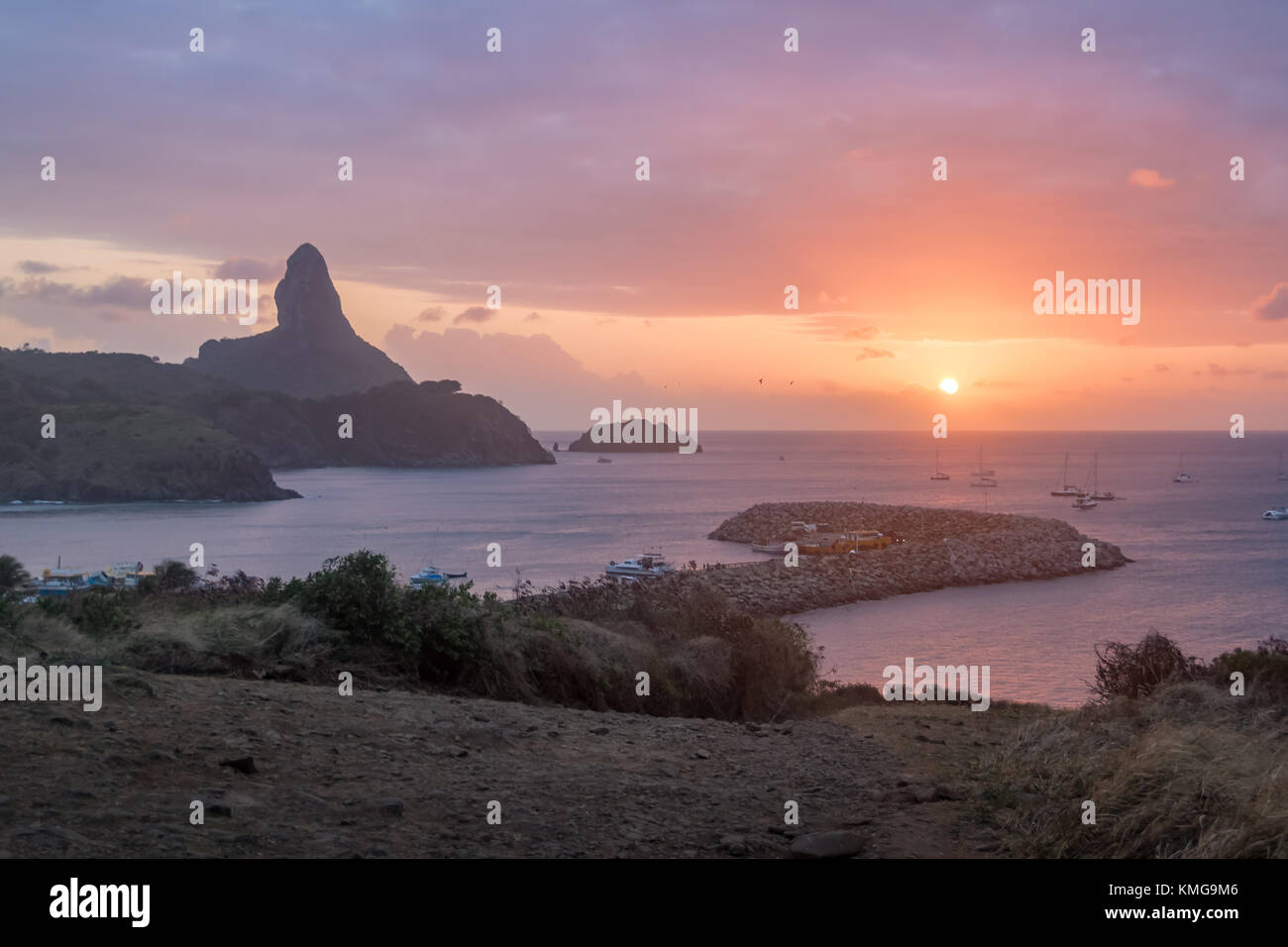 Sunset view of Fernando de Noronha with Morro do Pico and Santo Antonio ...