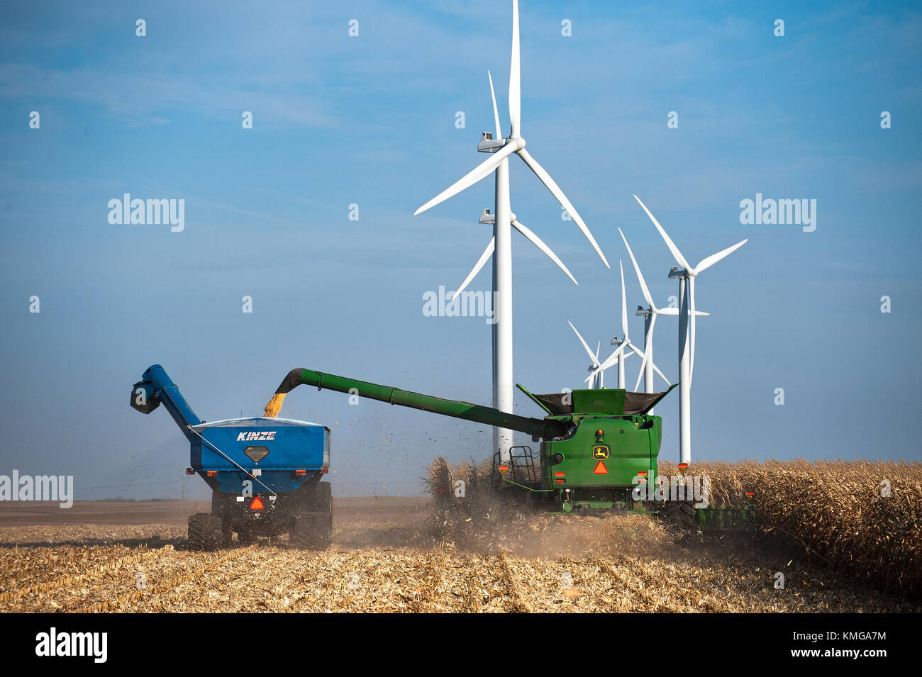 Combine Harvester On Field And Wind Turbine High Resolution Stock ...