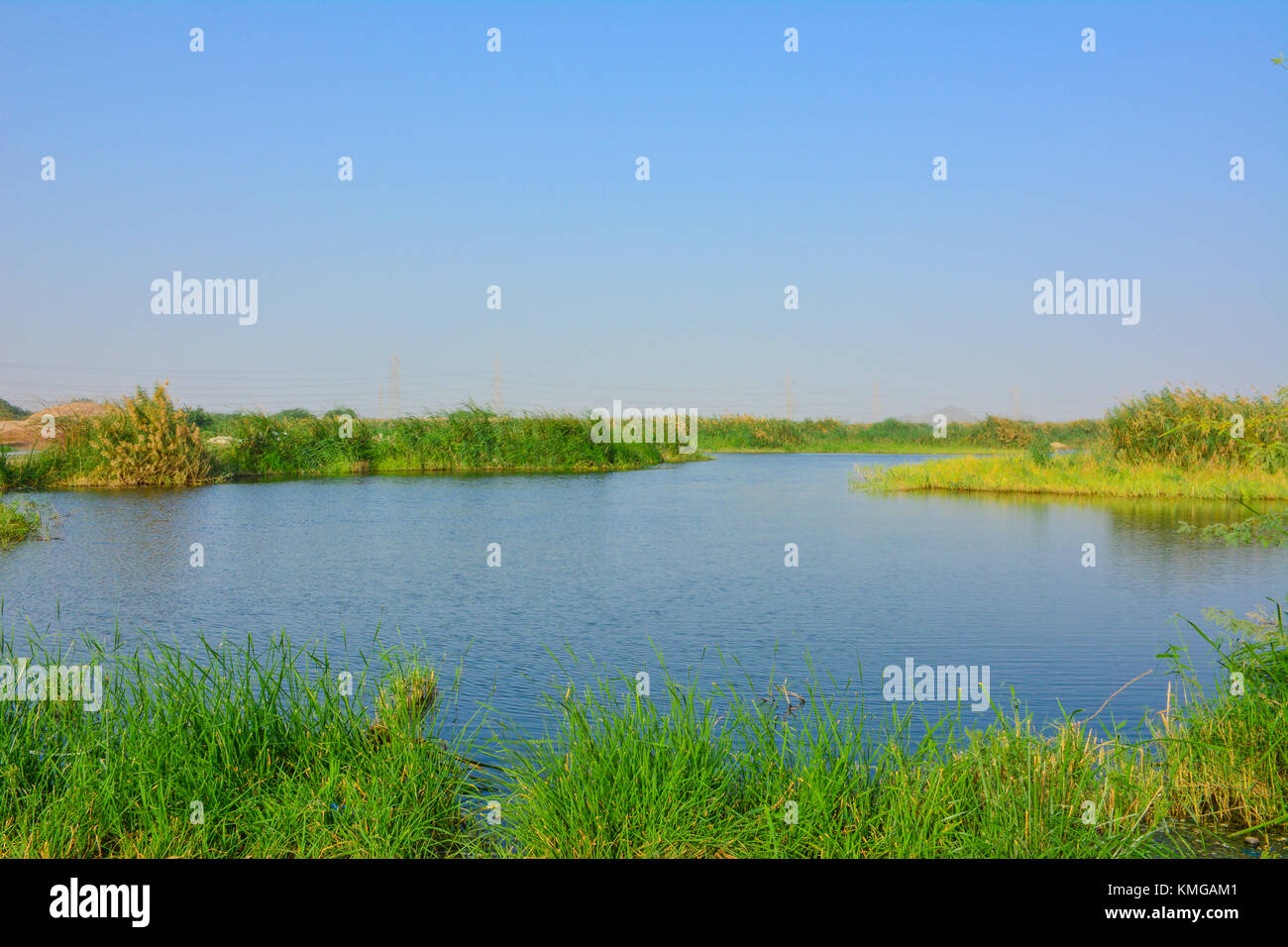 Beautiful green valley lake Stock Photo - Alamy