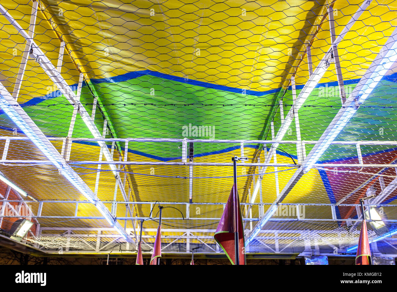 Bumper cars ceiling attraction. Metallic net detail Stock Photo - Alamy