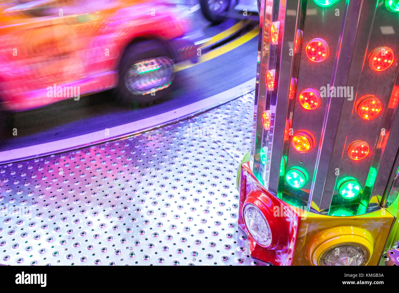 Fair ground ride childrens cars track. Funfair concept Stock Photo - Alamy