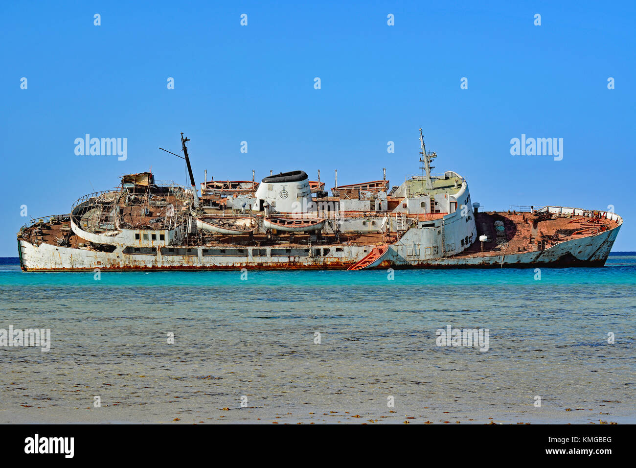 Shipwreck rusting in shallow water near Al Qattan beach, south of ...