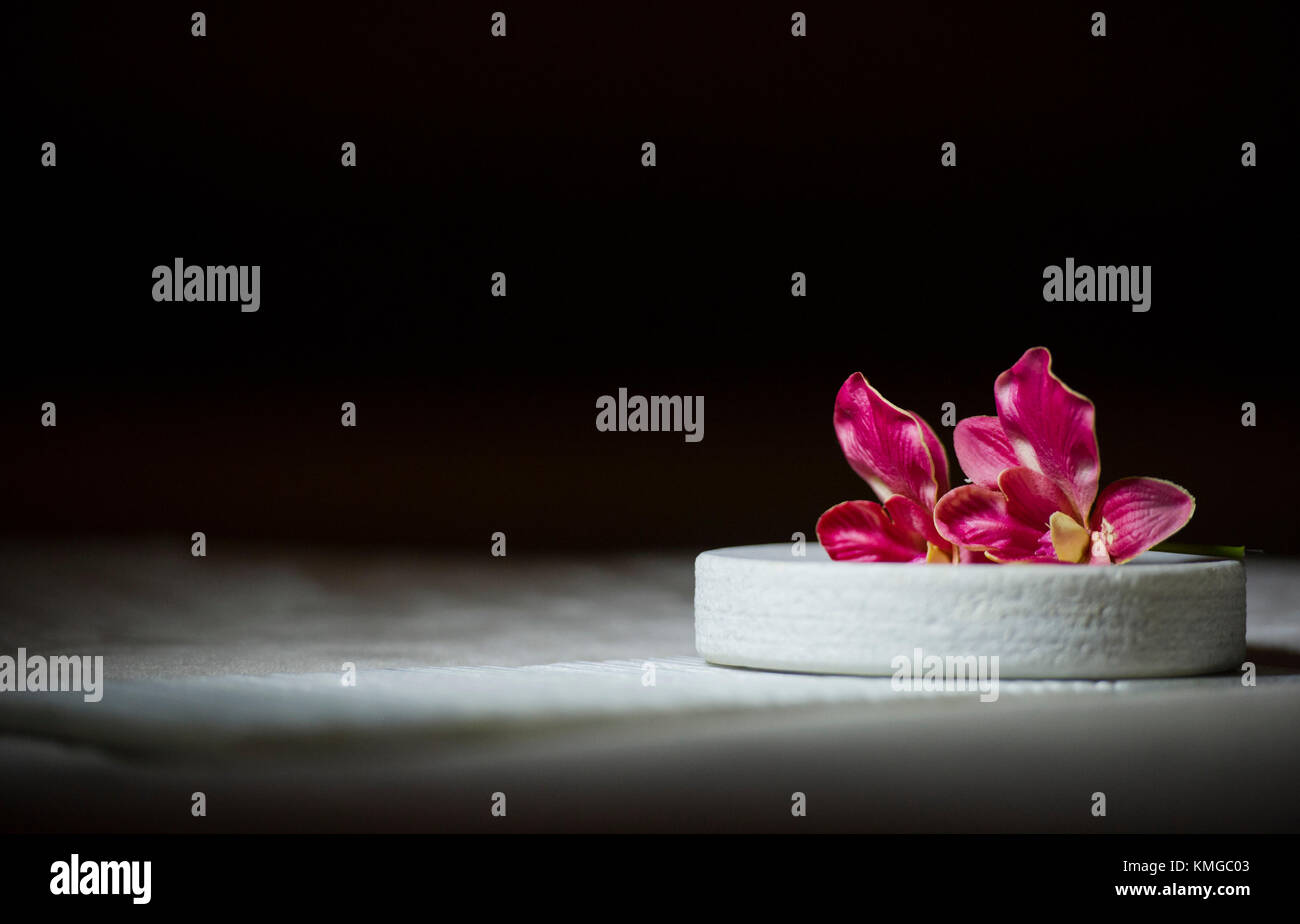 A decorative flower is shown in a massage room at a spa Stock Photo - Alamy