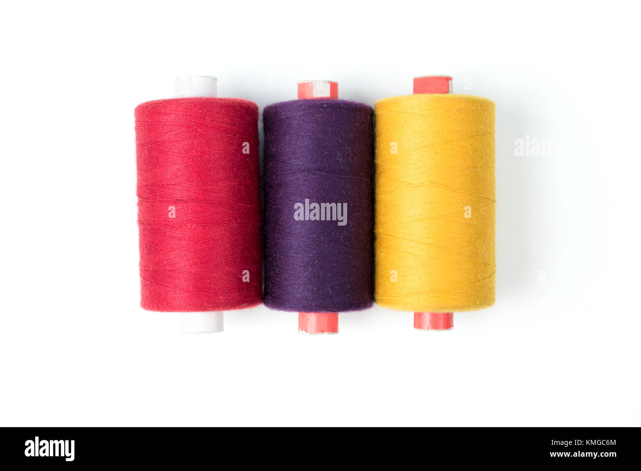 Colored thread coils on a white background, sewing accessories Stock ...