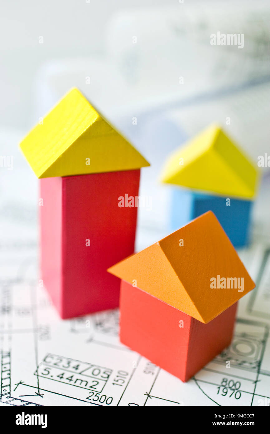 house made of wooden blocks on blueprints Stock Photo - Alamy