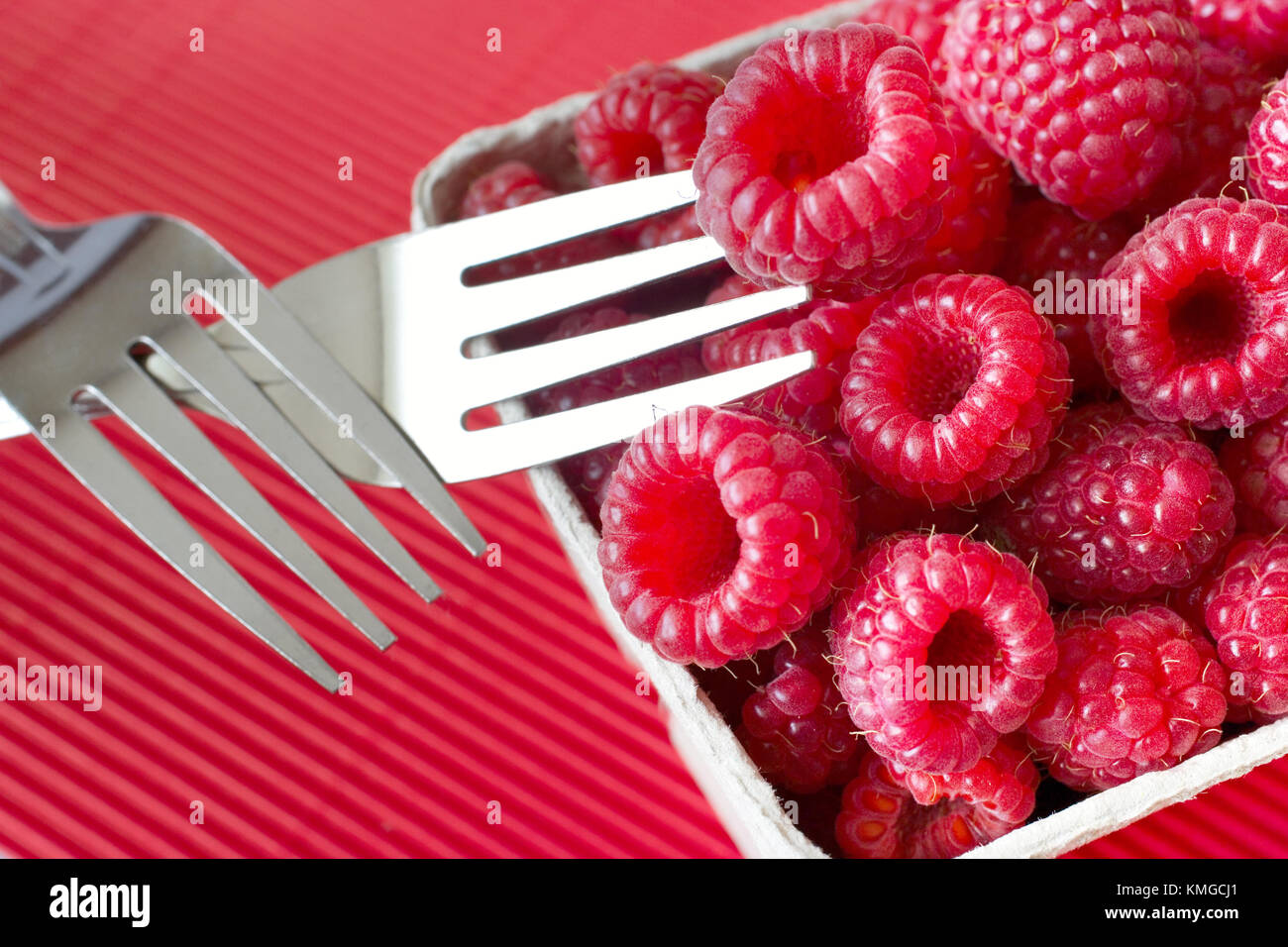 fresh red raspberries - raspberry fruit in the kitchen Stock Photo - Alamy