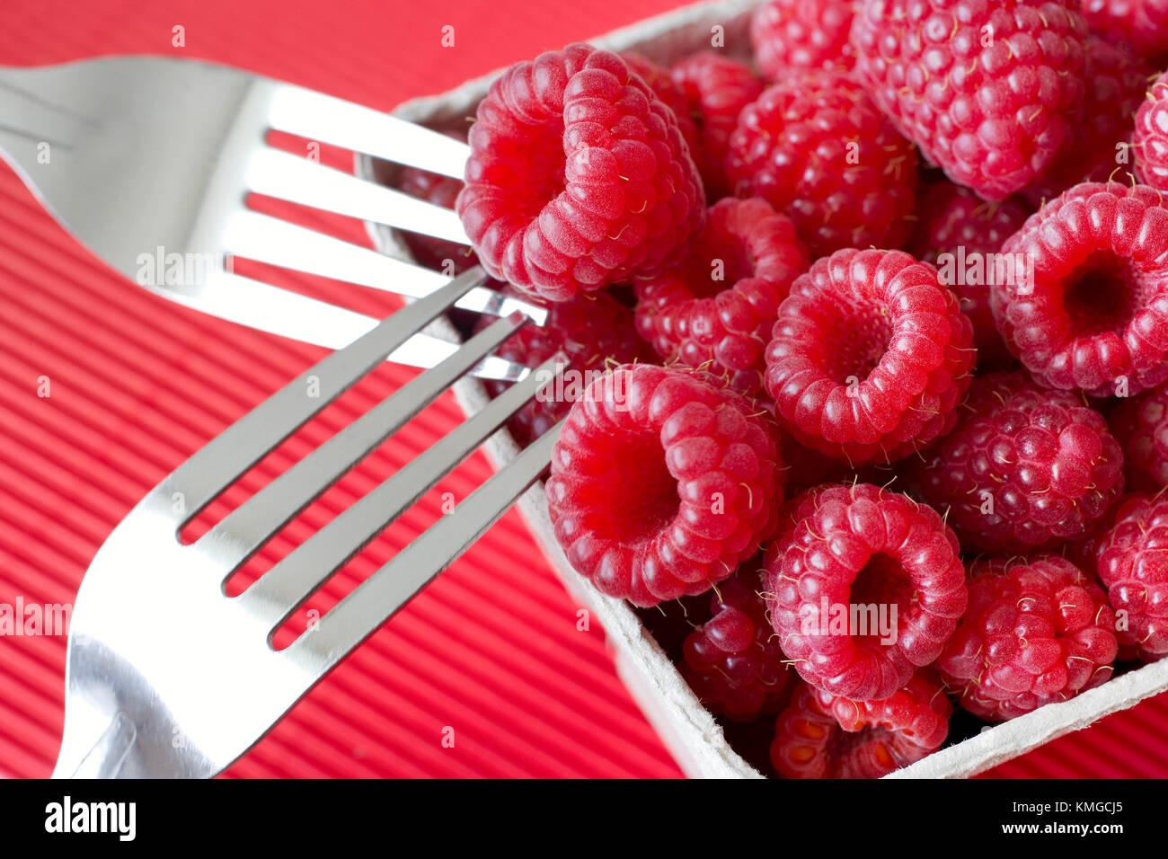 fresh red raspberries - raspberry fruit in the kitchen Stock Photo - Alamy