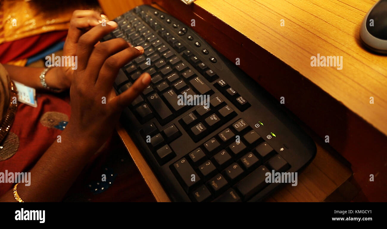 Young girl using system, woman using and typing on keyboard Stock Photo ...