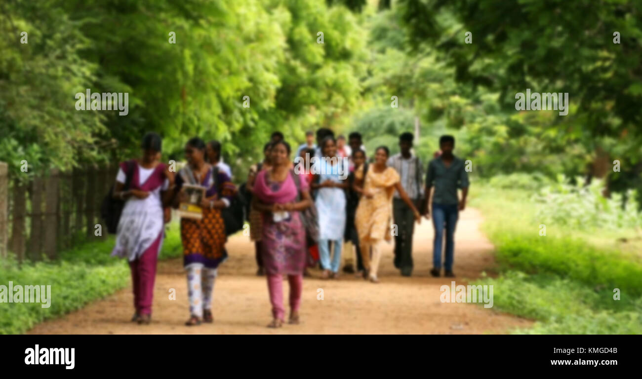 Group of students walking outdoors Stock Photo - Alamy