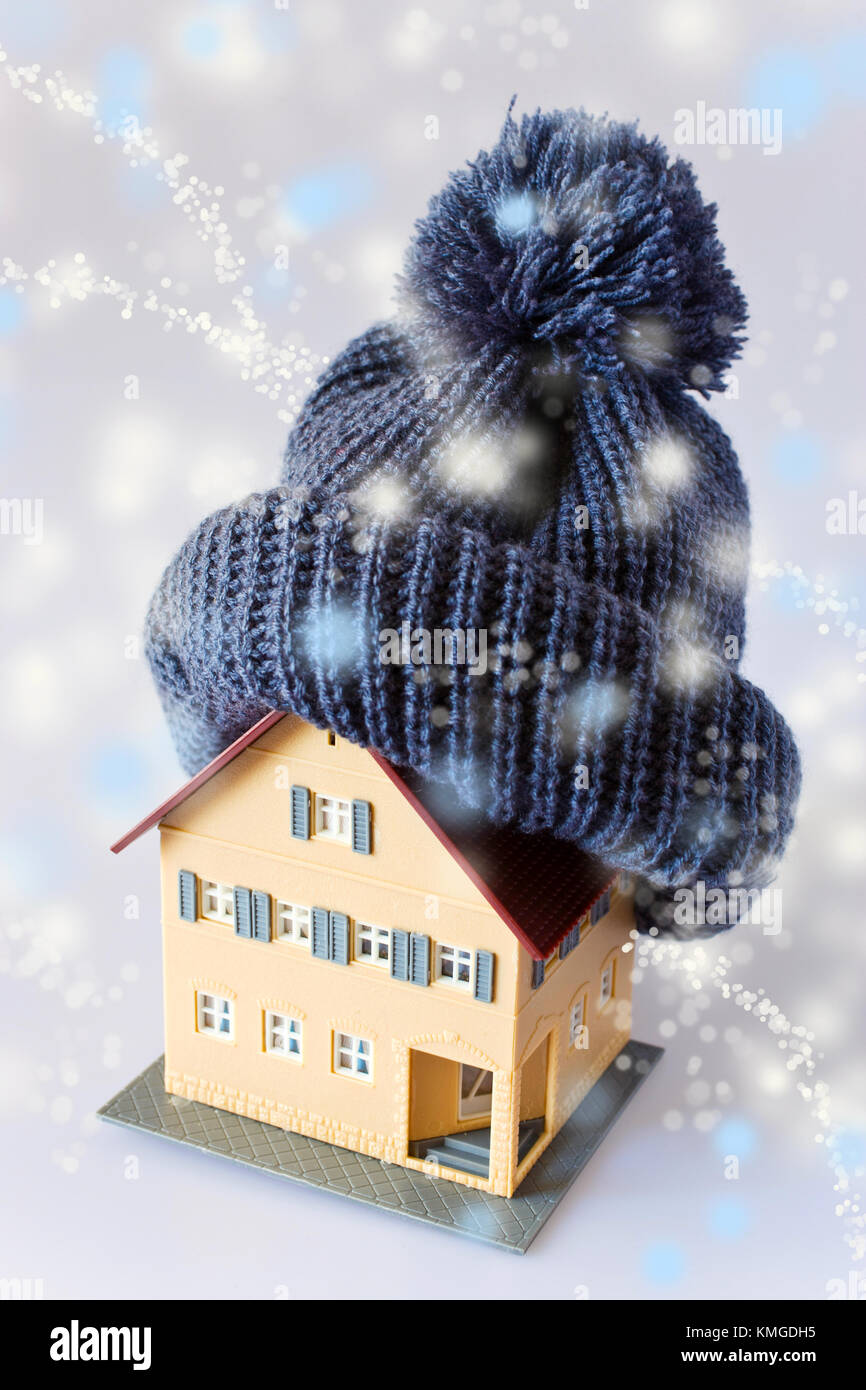 house in winter - heating system concept and cold snowy weather with ...