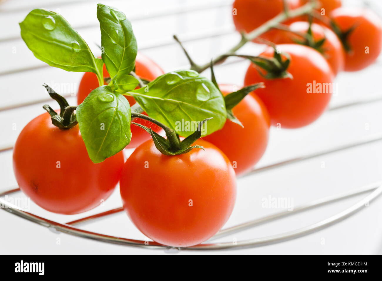 fresh red tomatoes in the kitchen Stock Photo - Alamy