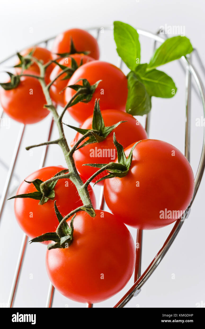 fresh red tomatoes in the kitchen Stock Photo - Alamy