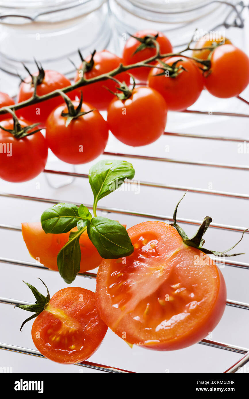 fresh red tomatoes in the kitchen Stock Photo - Alamy