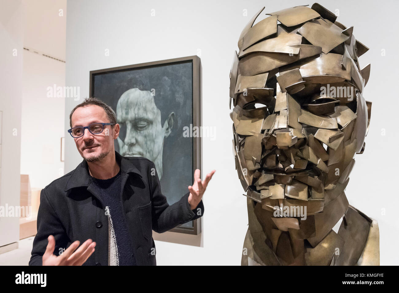 London, UK. 7 December 2017. Artist Jonathan Yeo stands with his work ...