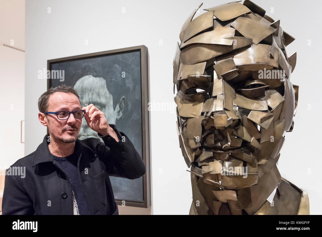 London, UK. 7 December 2017. Artist Jonathan Yeo stands with his work ...