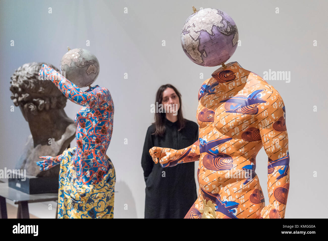 London, UK. 7 December 2017. A staff member views (L to R) "Discobolus ...