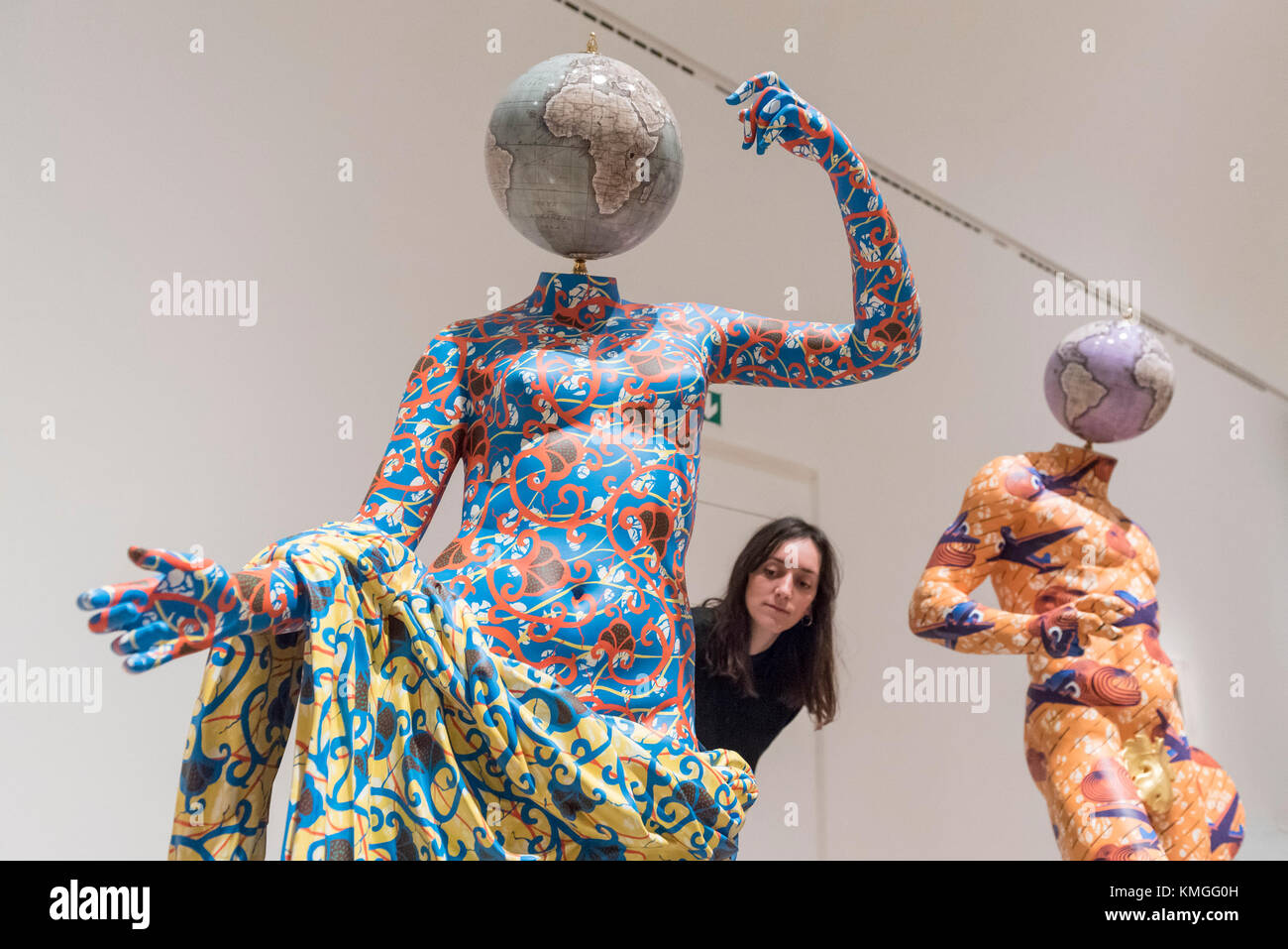 London, UK. 7 December 2017. A staff member views (L to R) "Discobolus ...