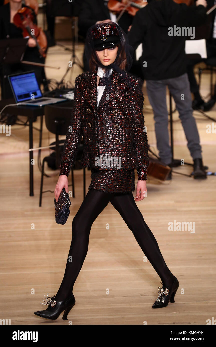 Hamburg, Germany. 6th Dec, 2017. A model presents a creation of German ...