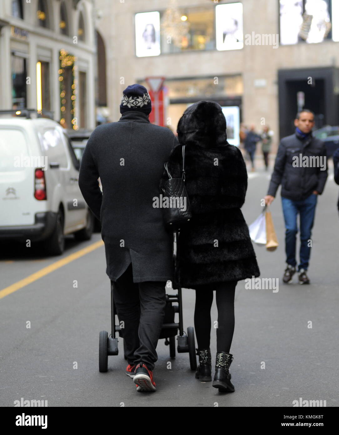 Milan, Cecilia Capriotti with boyfriend Gianluca and daughter walking ...