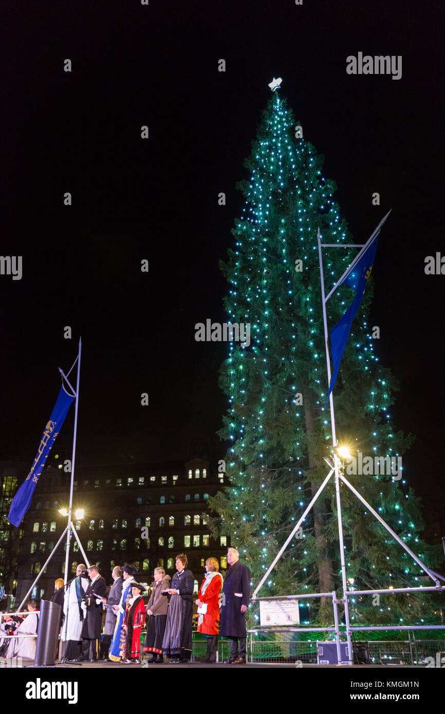 Festive christmas tree stands tall hi-res stock photography and images ...