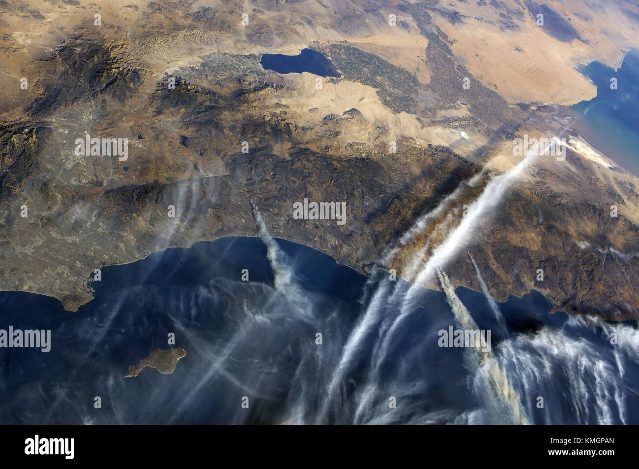 International Space Station, Earth Orbit. 07th Dec, 2017. Smoke from ...