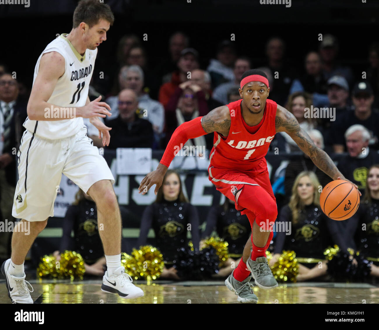 December 06, 2017: New Mexico's Chris McNeal dribbles up the courtpast ...