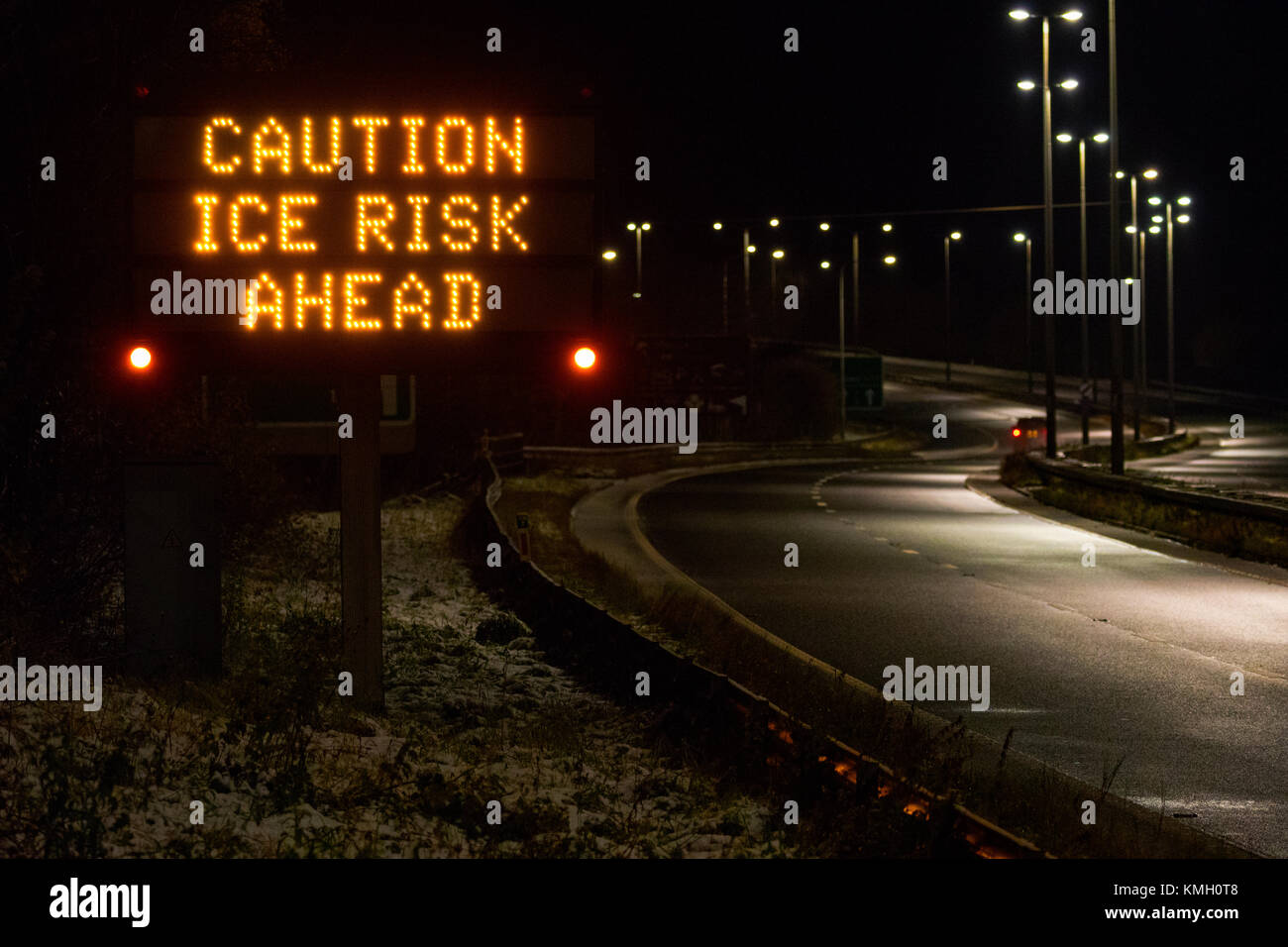 A55 neon road sign at night displaying warning sign to motorists ...