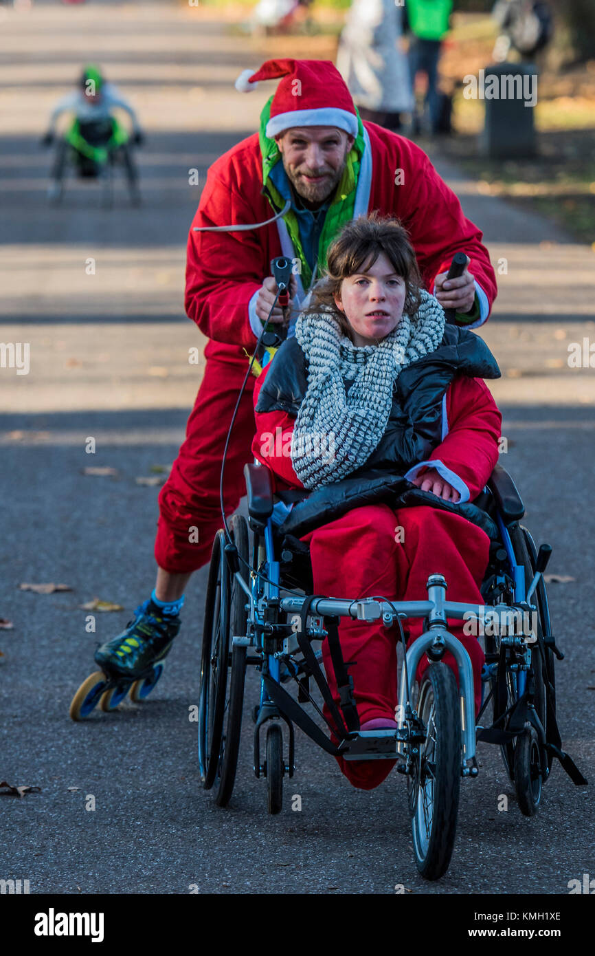 London, UK. 09th Dec, 2017. Wheelchair Santas were self-propelled or ...