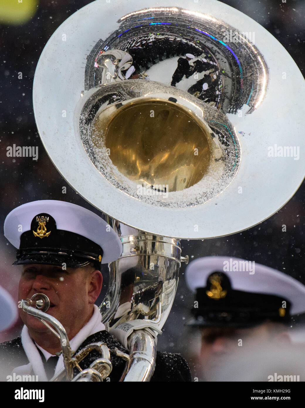 December 09, 2017: The trumpet player of The Navy Midshipmen plays in ...