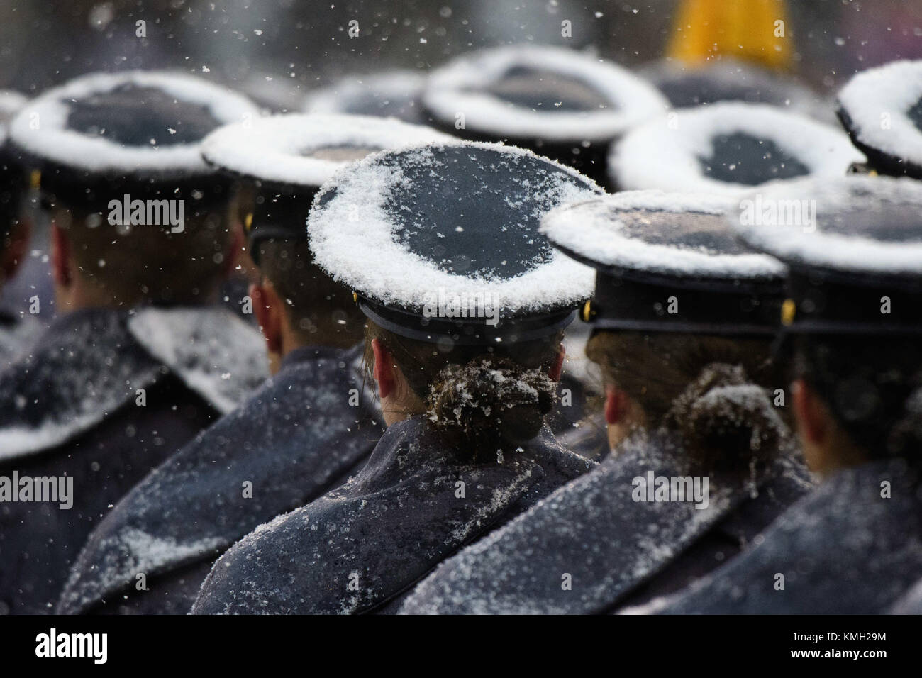 December 09, 2017: Snow rests on The Army Black Knights Cadets hats ...