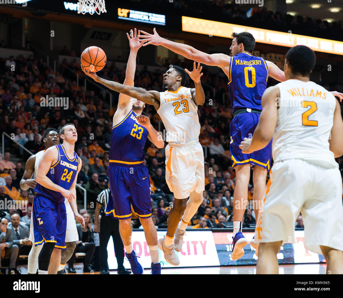 December 9, 2017: Jordan Bone #0 of the Tennessee Volunteers drives to ...