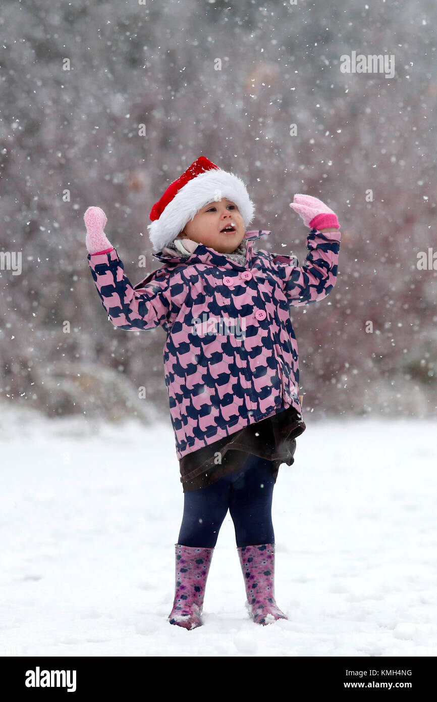 Cambridge, UK 10th December 2017. Ivy Mitchell, 2 has fun in the heavy ...