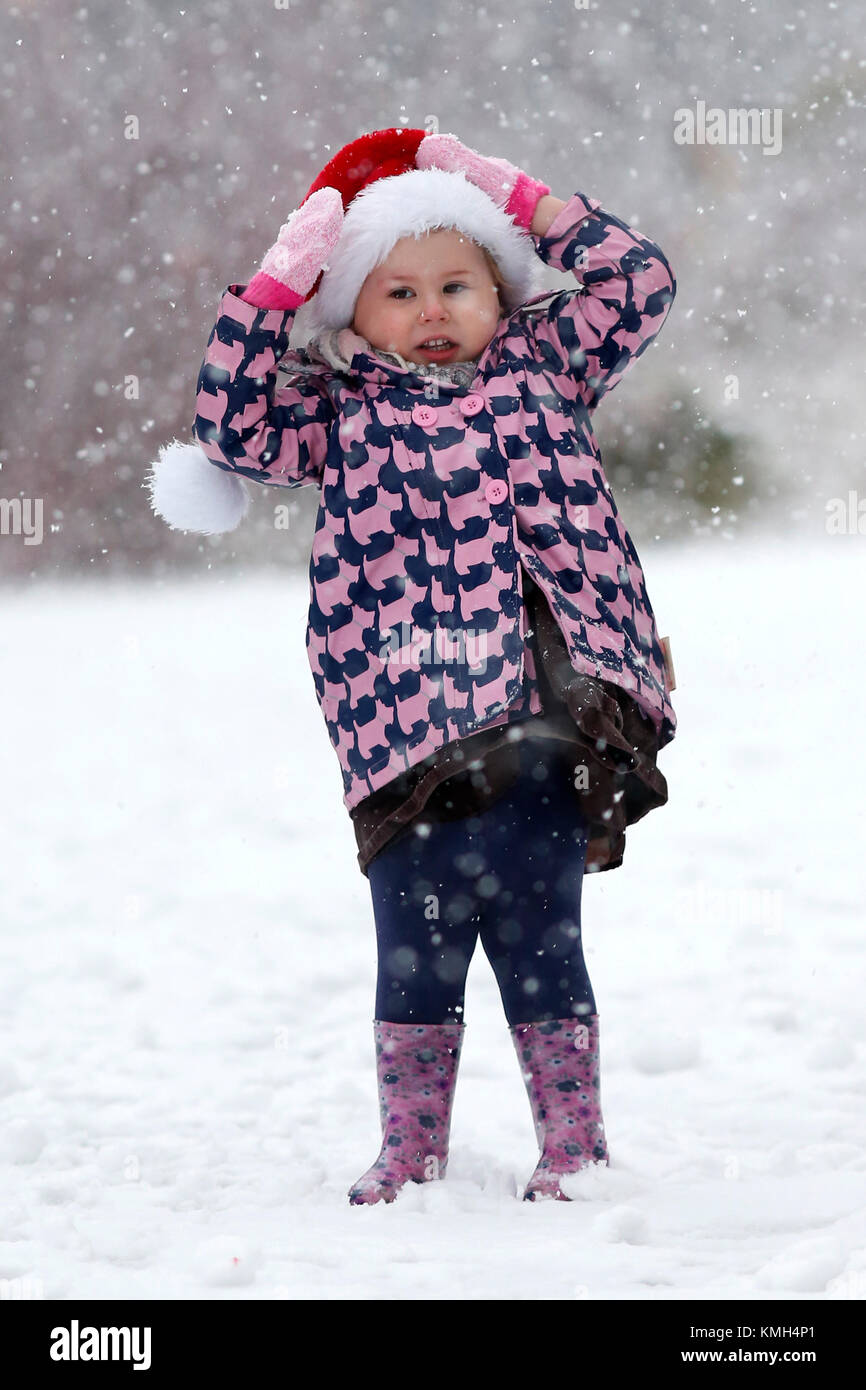Cambridge, UK 10th December 2017. Ivy Mitchell, 2 has fun in the heavy ...