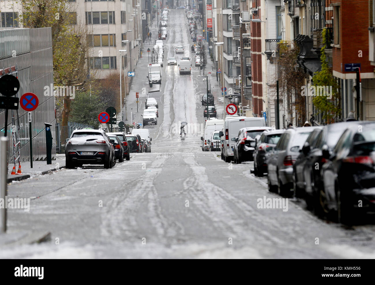 Brussels, Belgium. 10th Dec, 2017. Pedestrians walk on a street after a ...