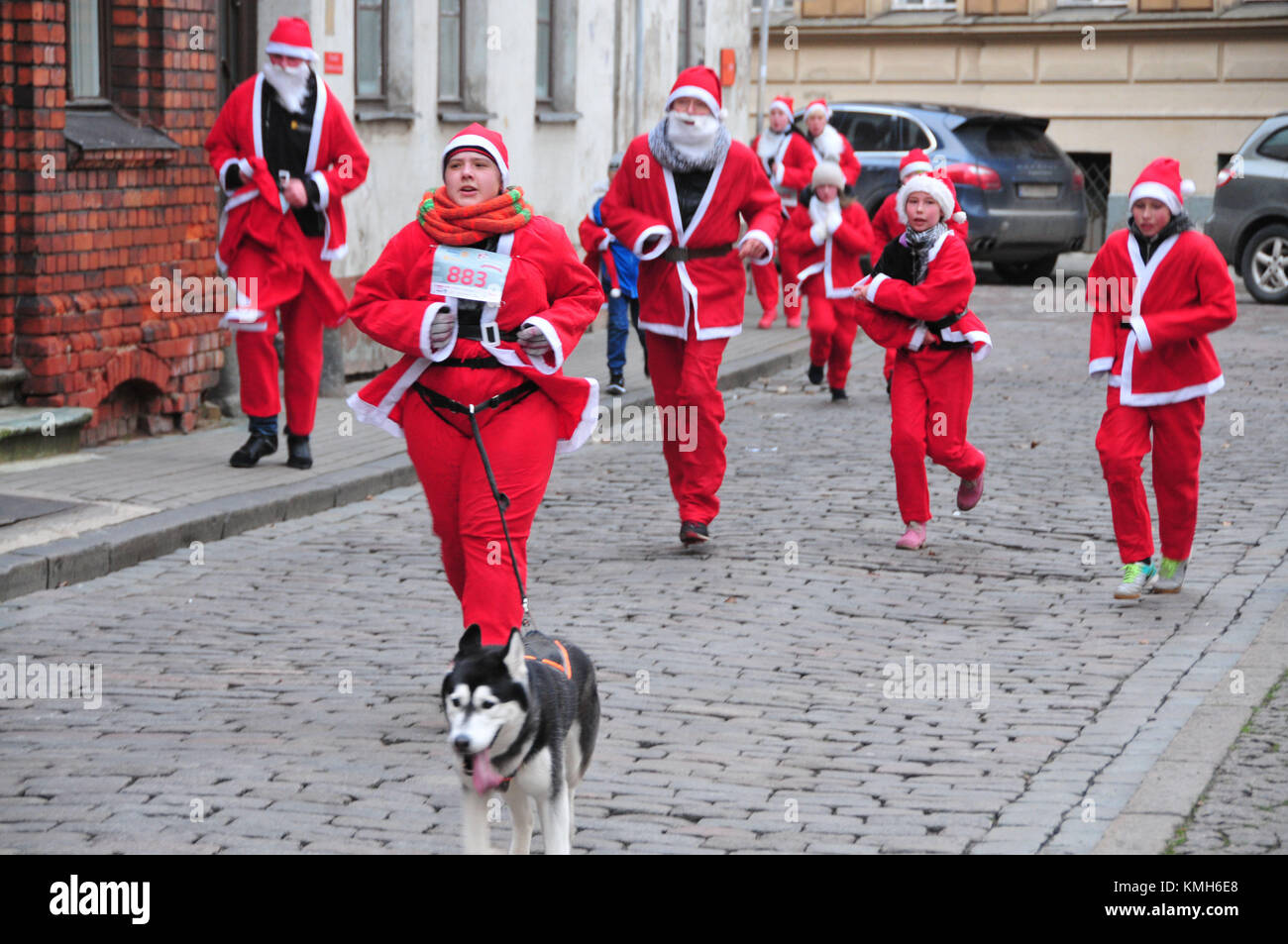 Riga, Latvia. 10th Dec, 2017. People dressed in Santa Claus' costumes ...