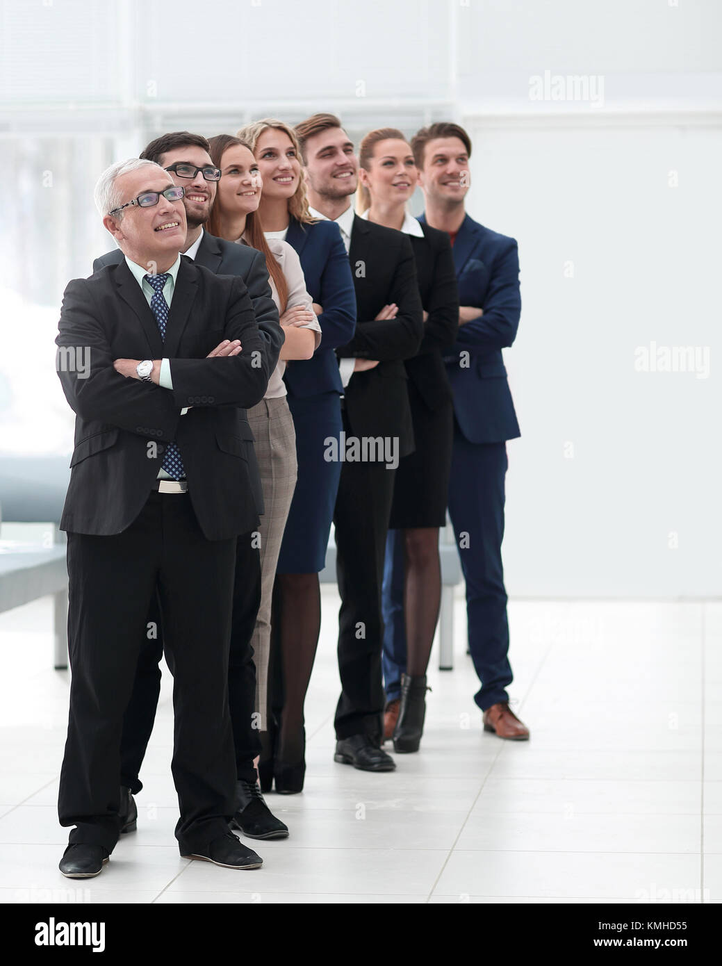 professional team confidently look forward, standing in the middle of ...